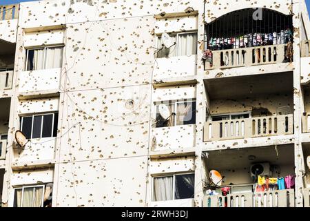 Residential buildings riddled with bullet holes in Tripoli, Lebanon ...