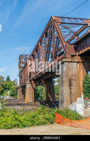 A view of an old rusty train trestle at the Lock in Ballard, Washington ...