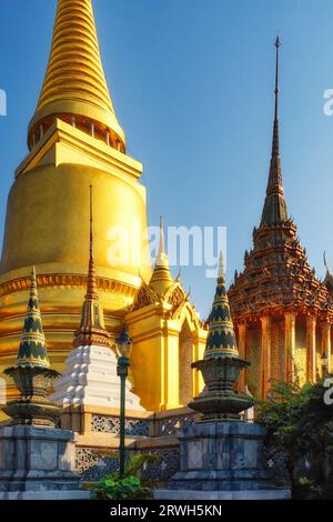 Asian temple complex structures feature dark tiled curved roofs against ...