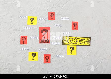 Quiz form and cards with question marks on grunge white background ...