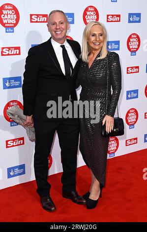 Robert Rinder and his mother Angela Cohen after receiving their MBE ...