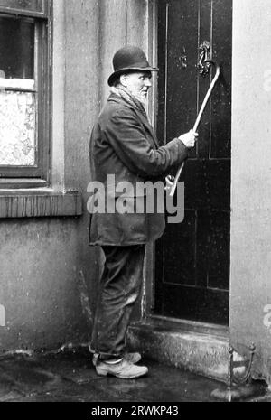Knocker up, Victorian period Stock Photo - Alamy