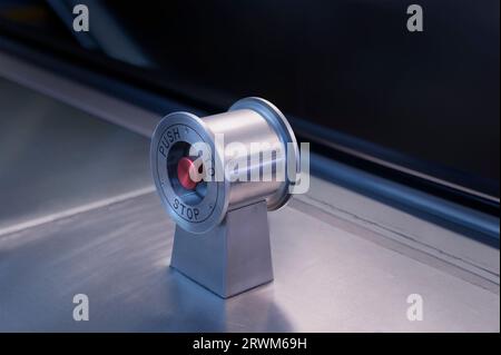 Escalator emergency stop button Stock Photo - Alamy