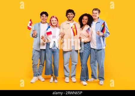 happy students of different nationalities holding hands together Stock ...