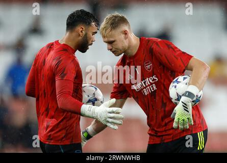 Arsenal goalkeepers David Raya (left) and Aaron Ramsdale warming up ahead of the Premier League ...