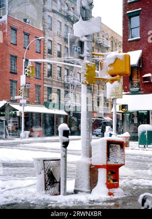 Entrance in the snow of Christopher Street Station at the corner of ...
