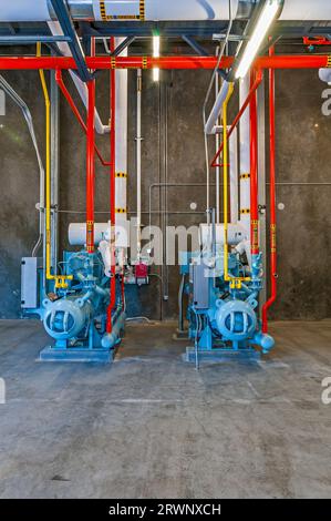 Compressor room in ammonia-cycle industrial refrigeration cold-storage ...