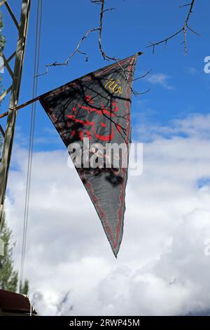 Shia Islam flag flying at a village in the Nagar Valley region of ...