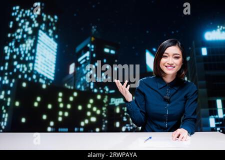 Presenter going live on transmission to open news segment for ...