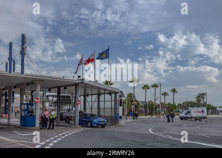 The view of customs checkpoint for cars from inside of the bus in a ...