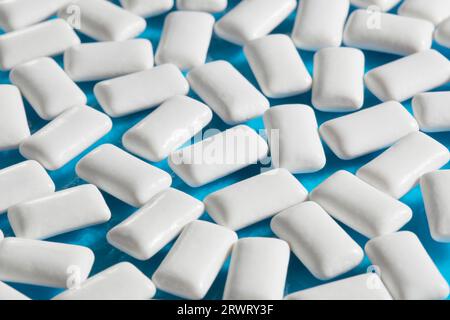 White rectangular Chewing gums on blue Stock Photo - Alamy