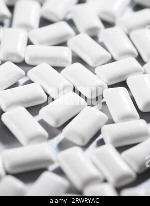 White rectangular chewing gum on grey Stock Photo - Alamy