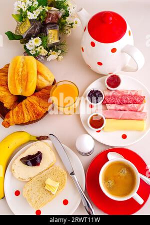 Breakfast set with rolls, coffee and other ingredients Stock Photo - Alamy