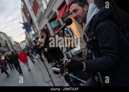 Andrew Glover of Irish pop group Keywest playing in Grafton Street with ...