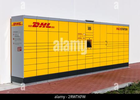 Parcel in locker of automated postal box. Package delivered to the ...