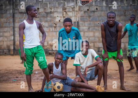 LAGOS, NIGERIA - SEPTEMBER 15: School boys playing soccer at Ansarudeen field Okota on September ...