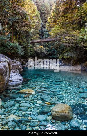Scenic Kiso river valley in early fall with leaves starting to change ...