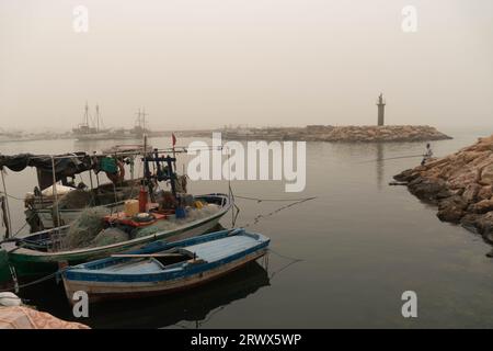 The port of Djerba after the sandstorm with the fishing and crab boats ...