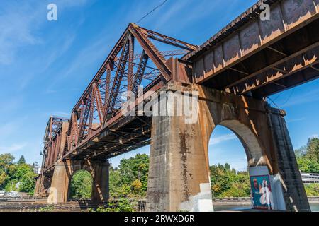 A view of an old rusty train trestle at the Lock in Ballard, Washington ...