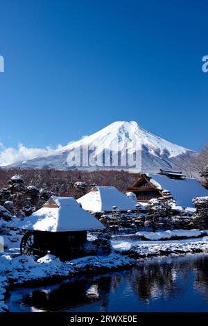 Snowy traditional Japanese building in Kinkaku-ji garden. Kyoto, Japan ...