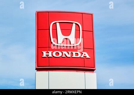 Honda sign outside in front of a Honda auto dealership photographed in ...