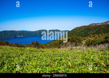 Lake Mashu and Mount Mashu, Bamboo Grass Field Stock Photo - Alamy
