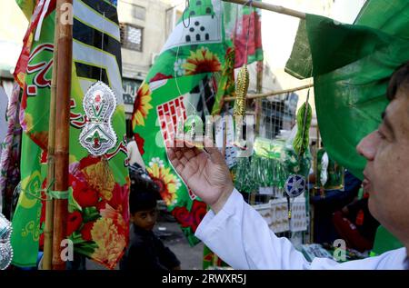 Buntings, flags, badges and souvenirs are being selling at roadside ...