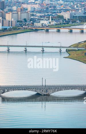 Historic Bandai Bridge and early morning scenery along Niigata Shinano ...