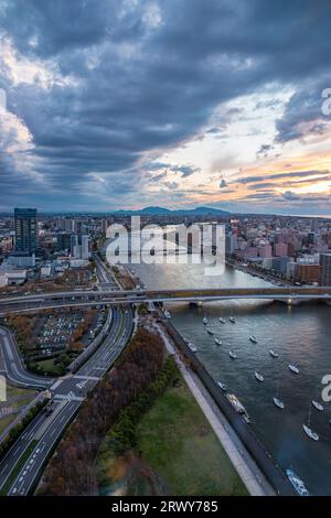 Beautiful sunset and the cityscape along the Niigata Shinano River ...