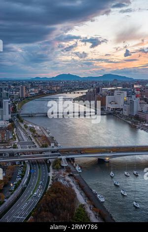 Beautiful sunset and the cityscape along the Niigata Shinano River ...