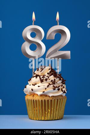 Vertical birthday card with number 82 candle - Green background with ...