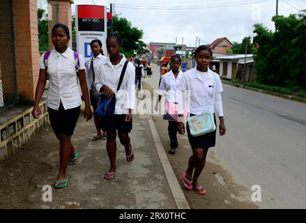 Malagasy college students walking home from the Lycee Technique college ...
