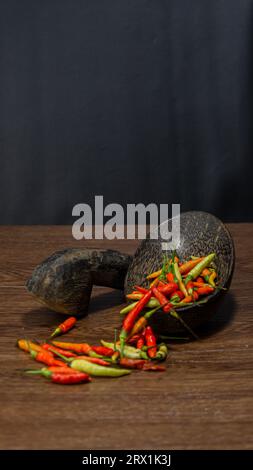Wooden pestle (Cobek and Ulekan) isolated on a white background. Is a ...