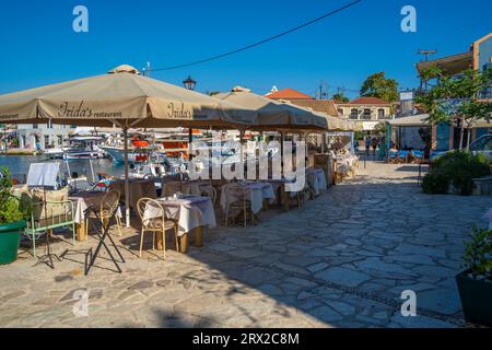 View of cafes and restaurants in Fiscardo harbour, Fiscardo, Kefalonia ...