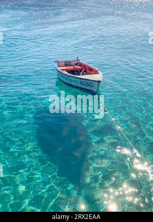 Small Lonely Boat Floating in the Sea at El Pajar, Gran Canaria, Spain ...