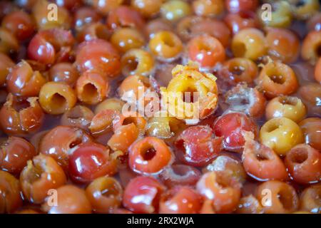 Boiling begonia fruits in the pot Stock Photo - Alamy