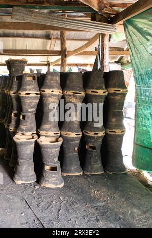 Clay bucket stoves being made by hand in Cambodia Stock Photo - Alamy