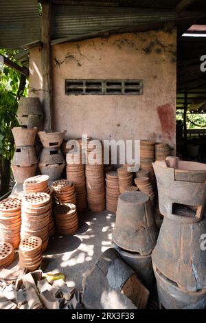 Clay bucket stoves being made by hand in Cambodia Stock Photo - Alamy