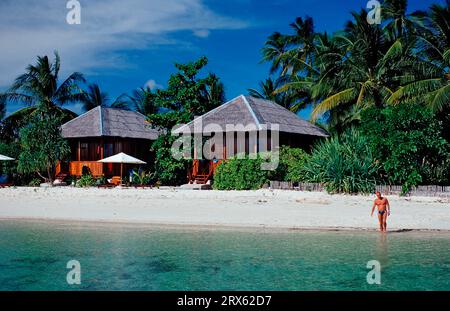 Tropical beach and beach bungalows, Wakatobi Dive Resort, Sulawesi ...