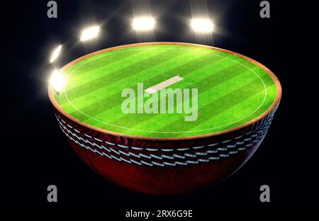 A cricket ball split in half revealing a marked green grass cricket ...