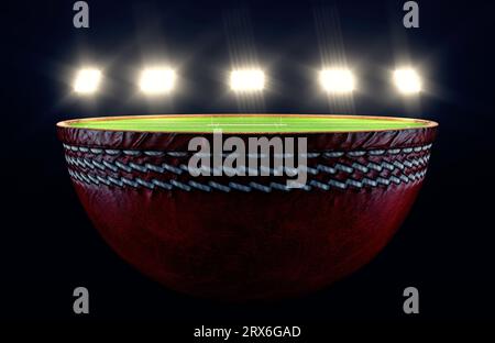 A cricket ball split in half revealing a marked green grass cricket ...