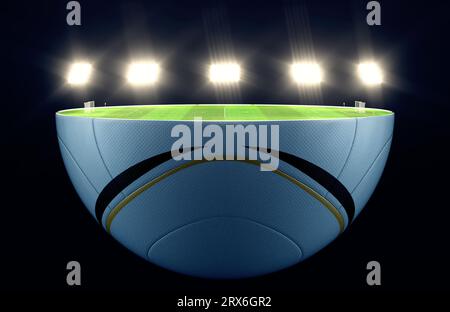 A soccer ball split in half revealing a marked green grass football ...