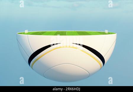 A soccer ball split in half revealing a marked green grass football ...
