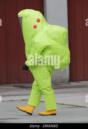 Protective suits against bacterial and toxic agents worn by scientists ...