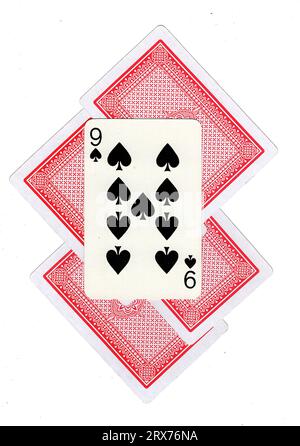 A montage of vintage playing card backs with the nine of hearts ...