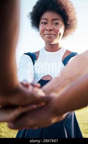 Sports, portrait and woman cheerleader in air on a field for motivation ...