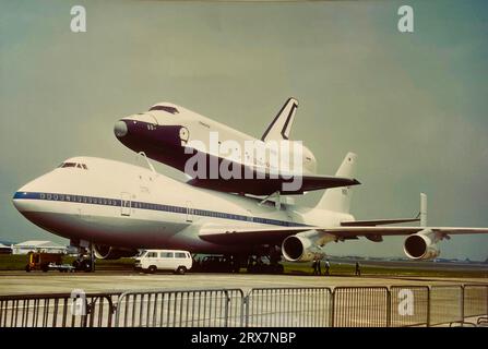 The NASA space shuttle prototype Enterprise waits to be hoisted by ...