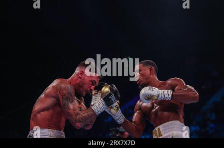 Ezra Taylor (right) against Joel McIntyre in the Light-Heavyweight ...