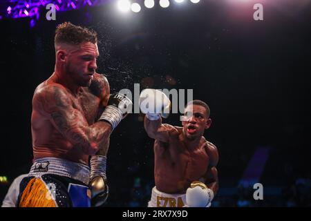 Ezra Taylor (right) against Joel McIntyre in the Light-Heavyweight ...