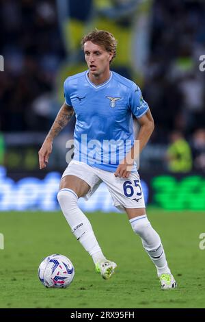 Lazio’s Italian midfielder Nicolo Rovella challenges for the ball with Roma’s Italian midfielder ...
